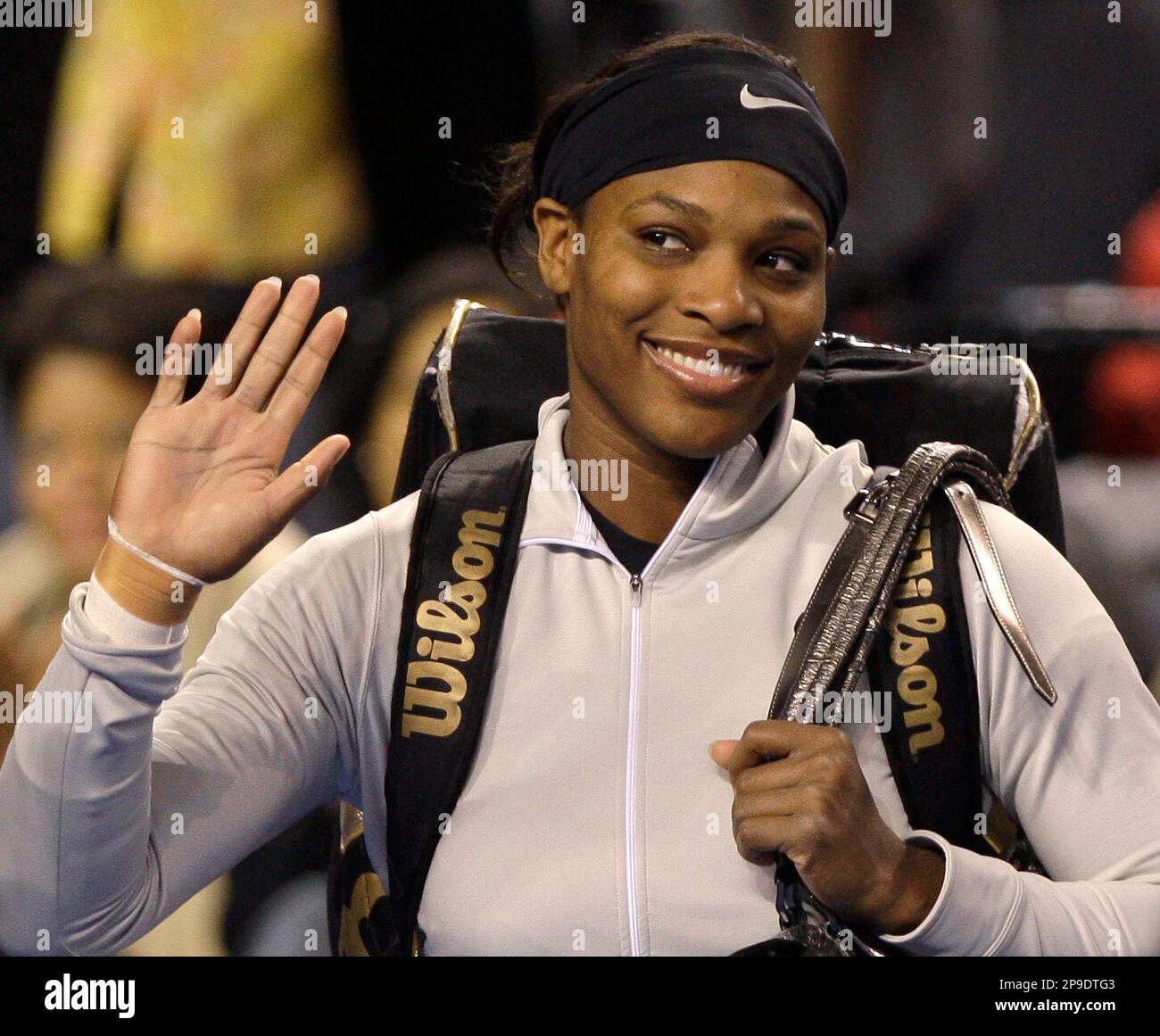 Serena Williams waves after being introduced before the start of an ...
