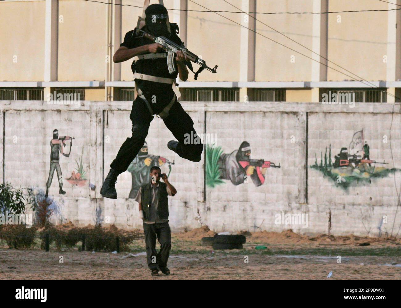 An armed Palestinian militant of the Hamas affiliated Popular ...