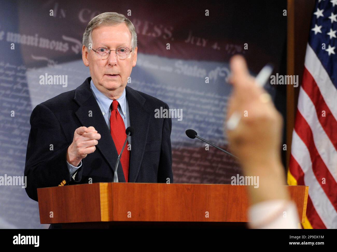 Senate Minority Leader Mitch McConnell of Ky. calls on a reporter ...