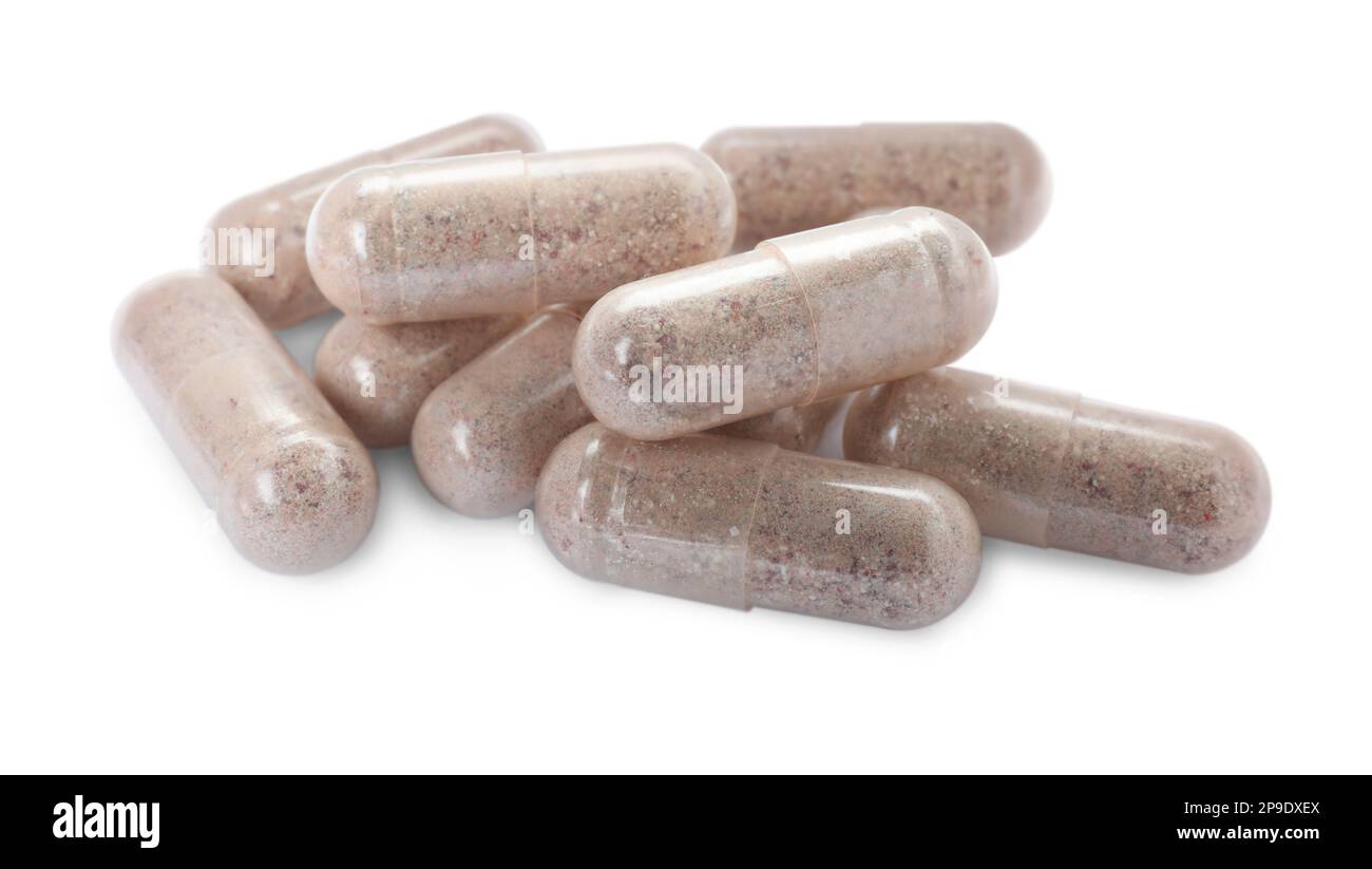 Many transparent gelatin capsules on white background Stock Photo - Alamy