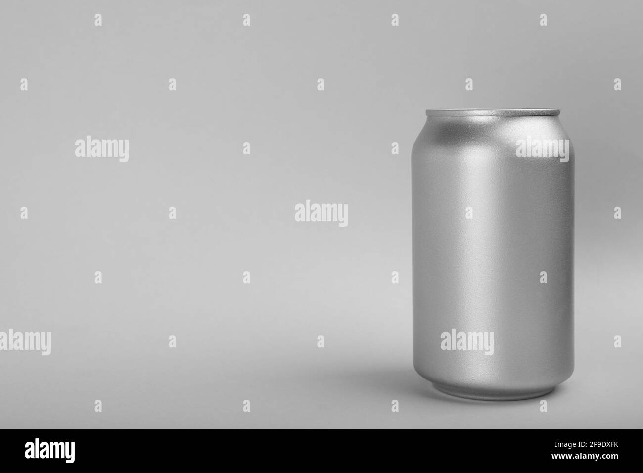 Can of energy drink on light grey background. Space for text Stock ...