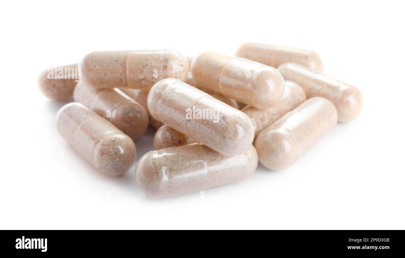 Many transparent gelatin capsules on white background Stock Photo - Alamy