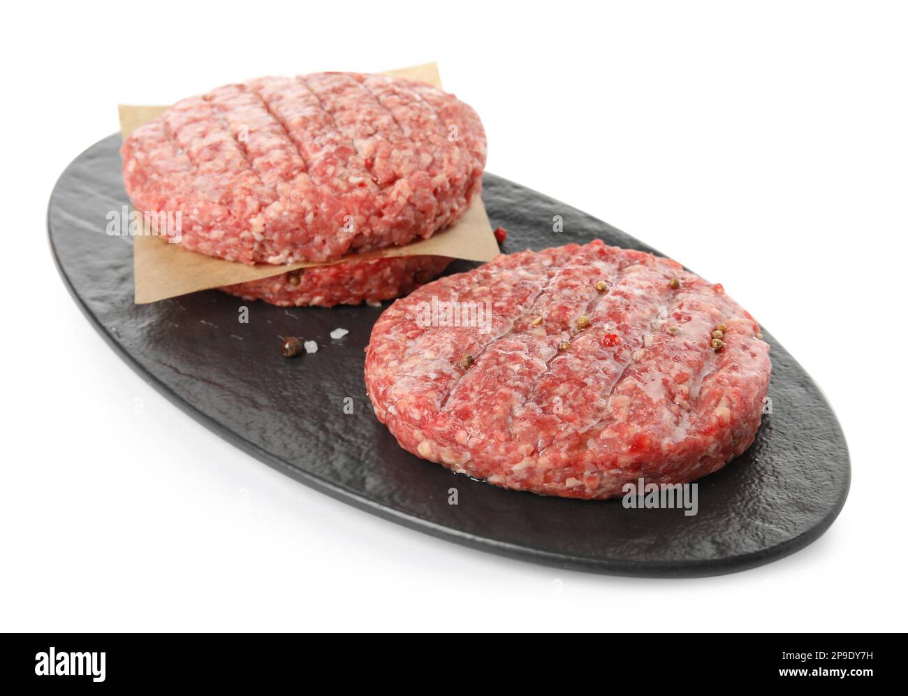 Raw hamburger patties with spices on white background Stock Photo - Alamy