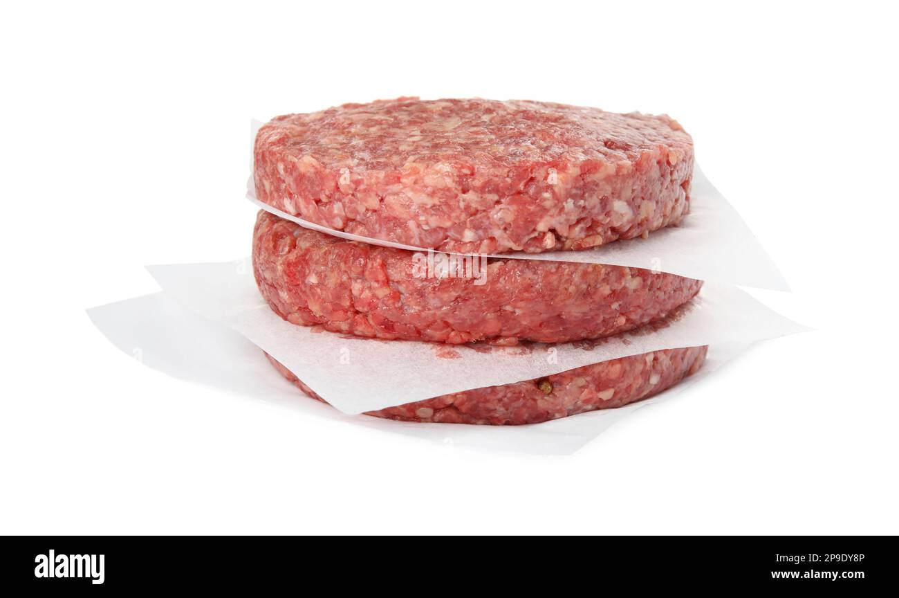 Stack of raw hamburger patties on white background Stock Photo - Alamy