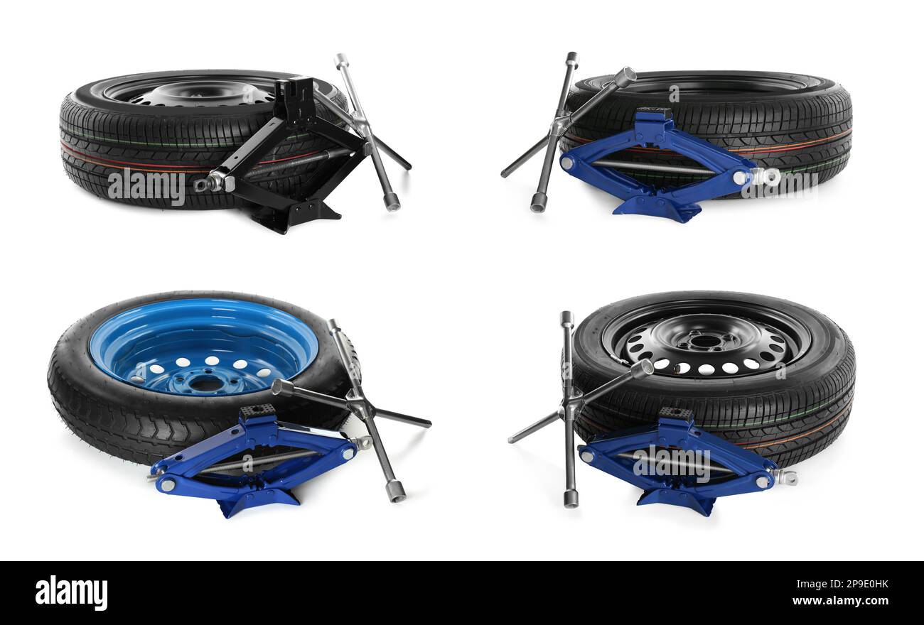 Set with scissor jacks, cross torque wrenches and wheels on white ...