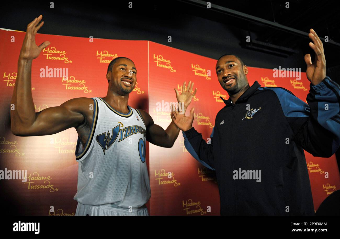 Washington Wizards basketball player Gilbert Arenas, right, poses with ...