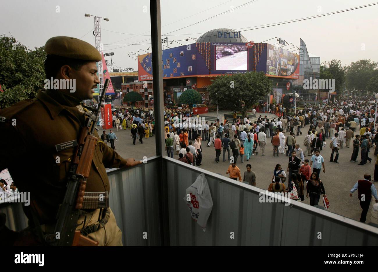 An Indian para-military force soldier stands guard at the 28th India ...