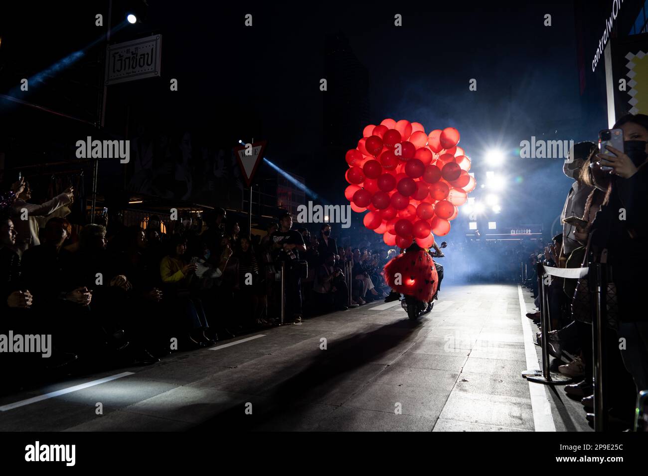 Bangkok, Thailand. 10th Mar, 2023. Models drive a motorcycle down the ...
