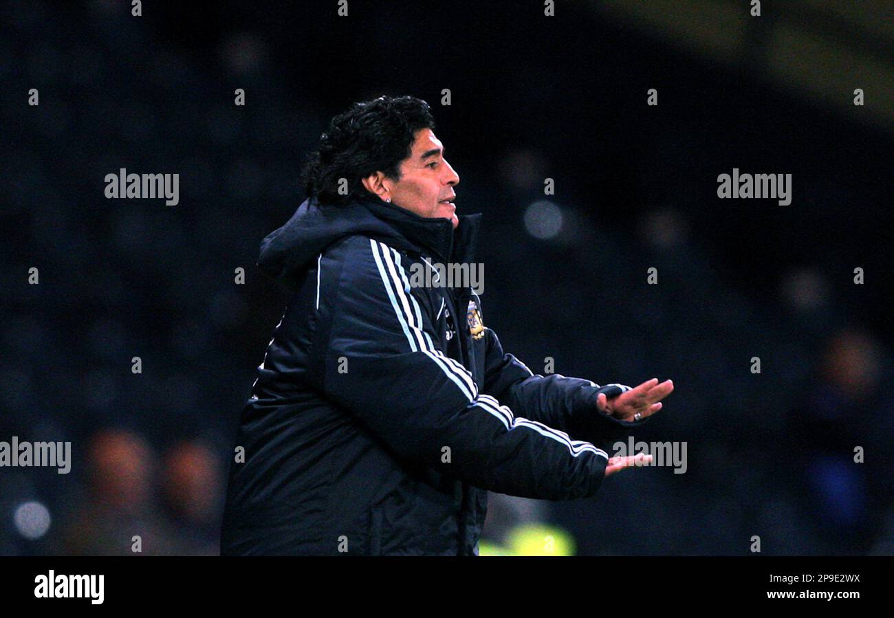 Argentina's coach Diego Maradona, gives instructions to his players during their international ...