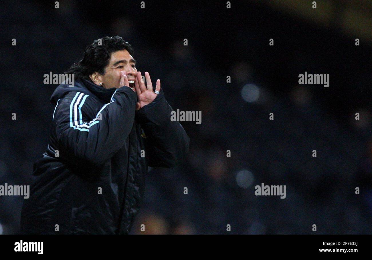 Argentina's coach Diego Maradona, shouts to his players during their international friendly ...