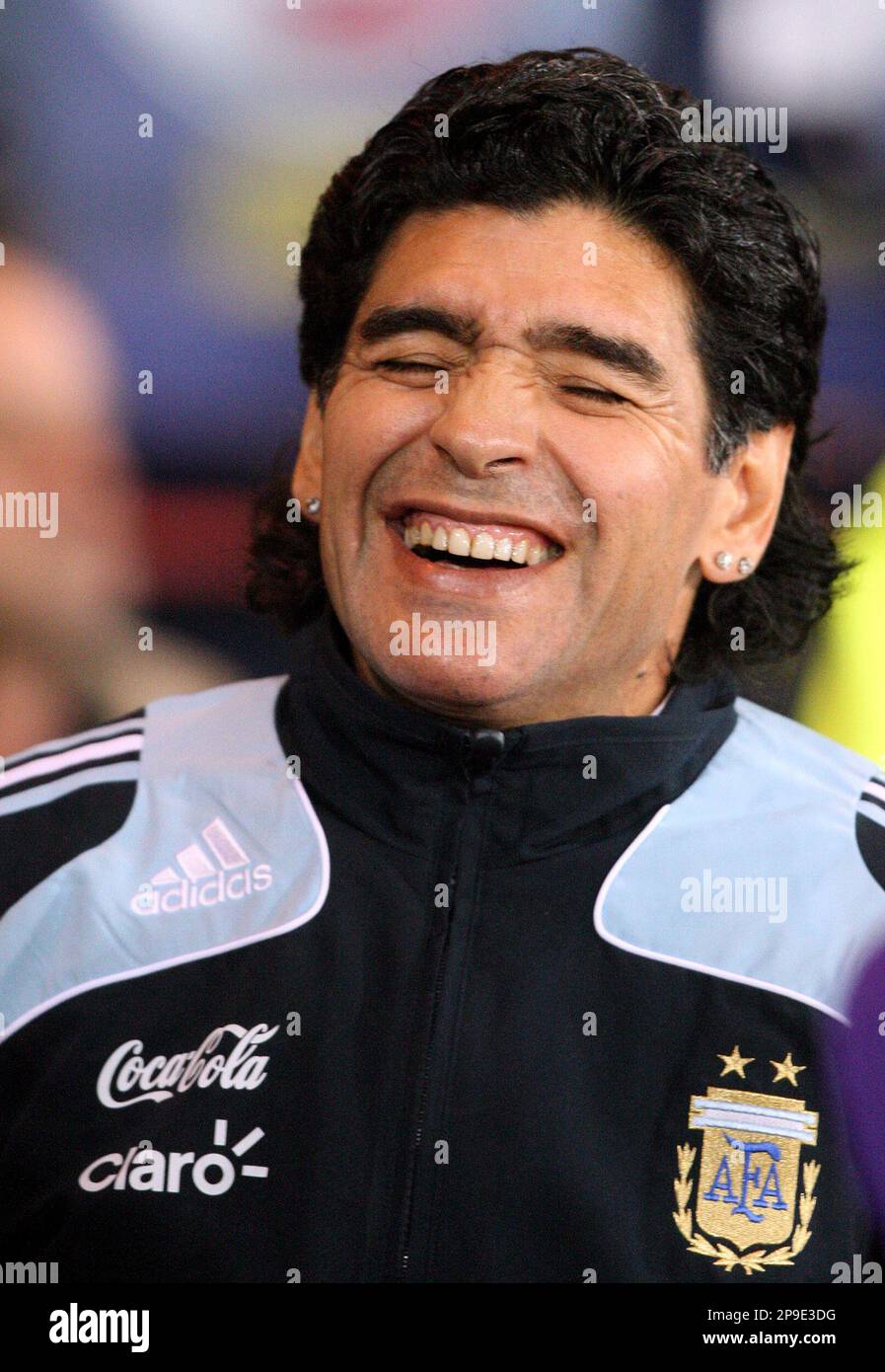 Argentina's coach Diego Maradona, laughs ahead of the international friendly soccer match ...