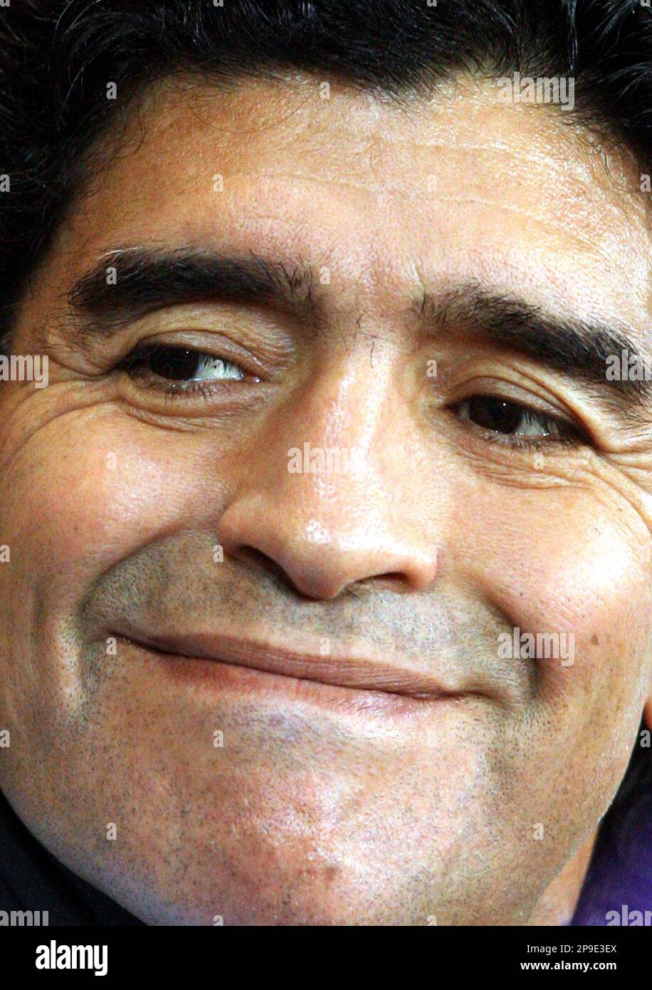 Argentina's coach Diego Maradona, smiles ahead of their international friendly soccer match ...