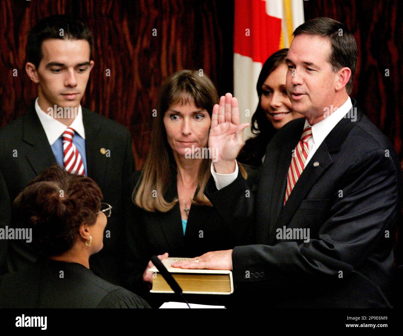 Sen. Jeffrey Atwater, R-Palm Beach Gardens, right, is sworn in as state ...