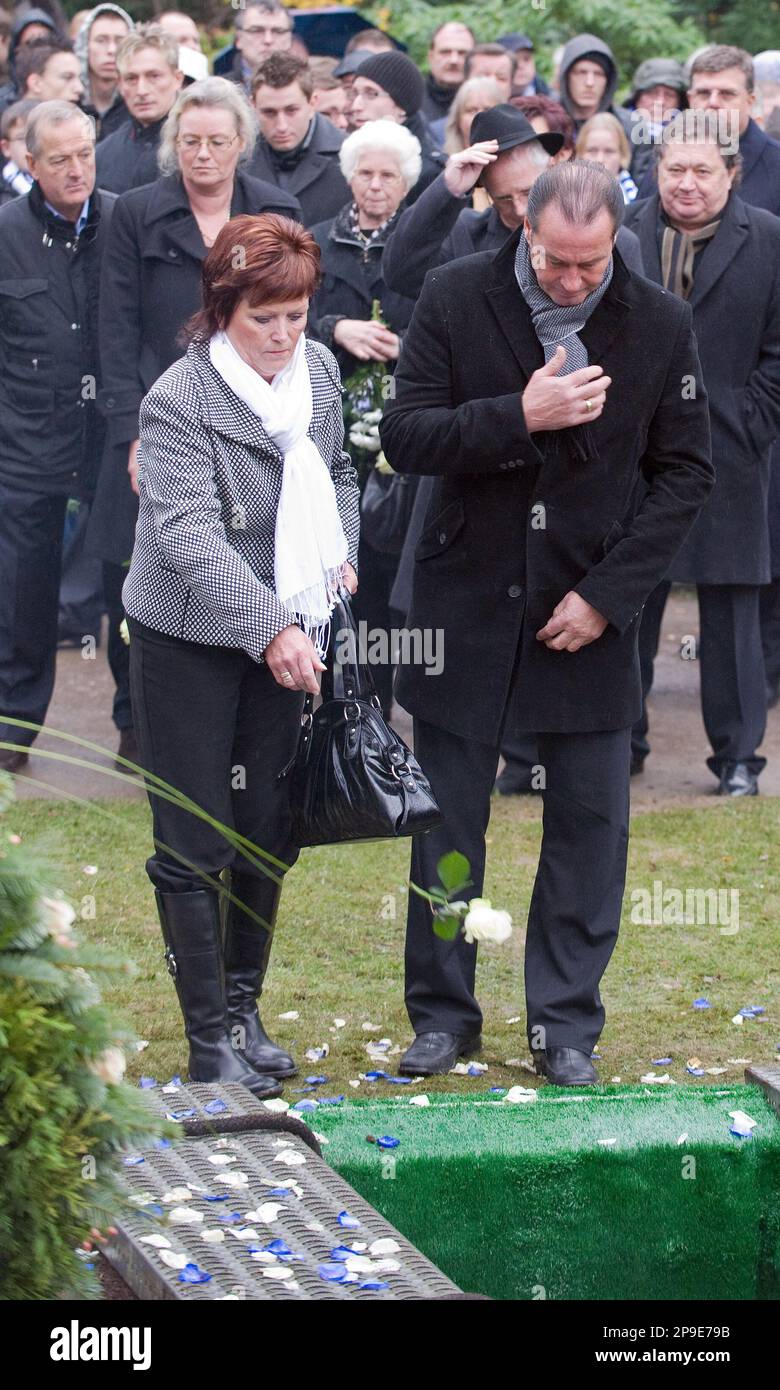 Soccer coach Huub Stevens, right, and wife Toos Stevens mourning with ...