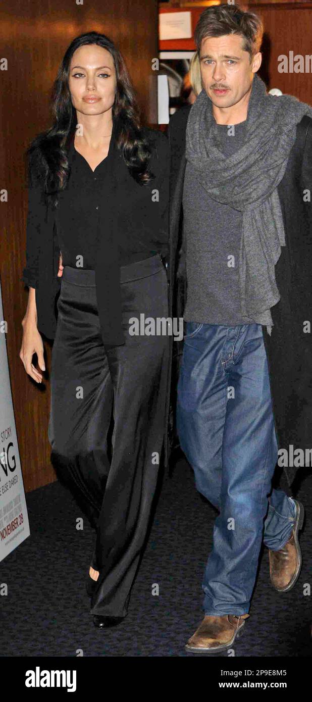 U.S. actors Brad Pitt and Angelina Jolie attend a screening of her film ...