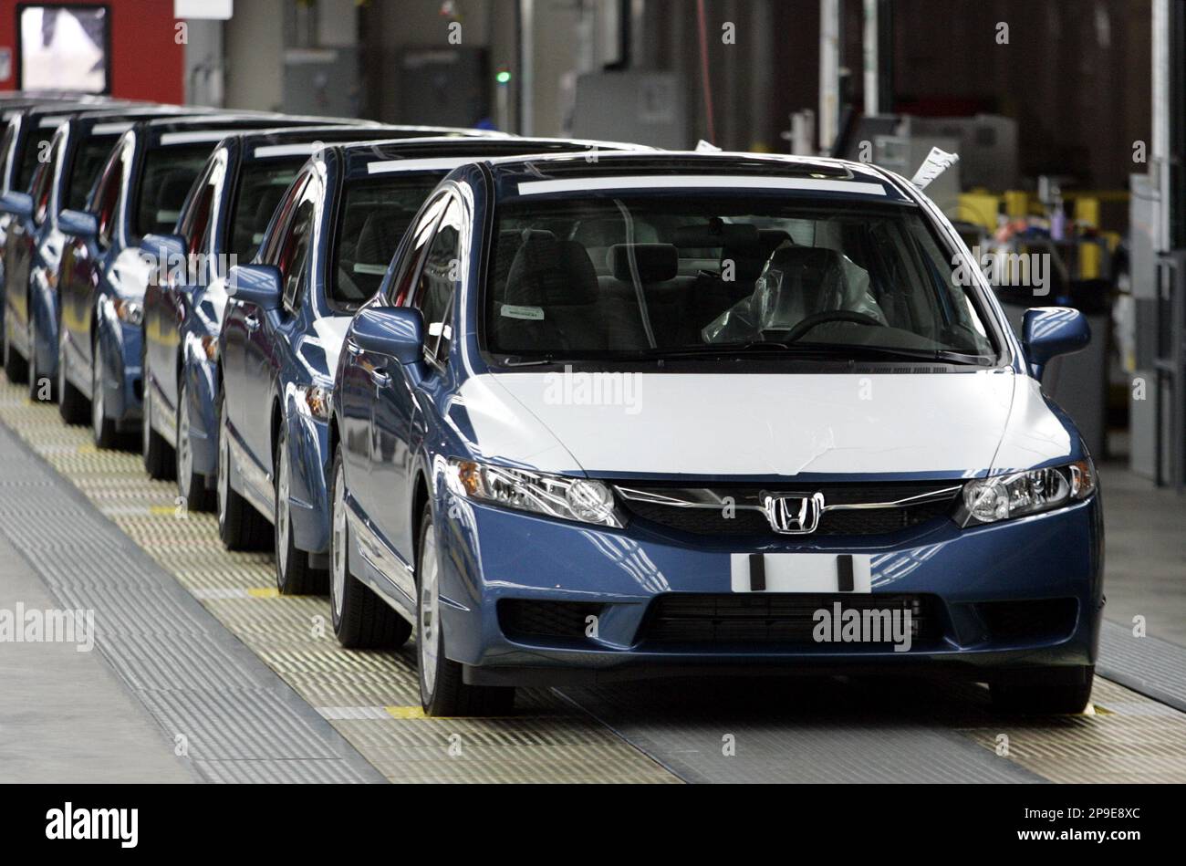 New Honda Civics are lined up at the Honda assembly plant in Greensburg ...