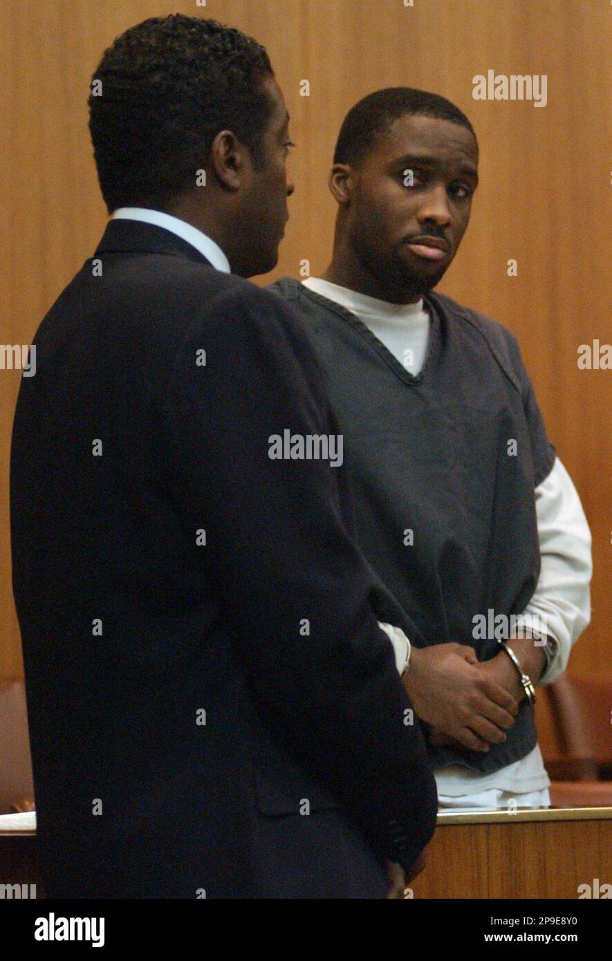 Nathaniel Abraham, left, listens to his attorney, Byron Pitts, in the ...