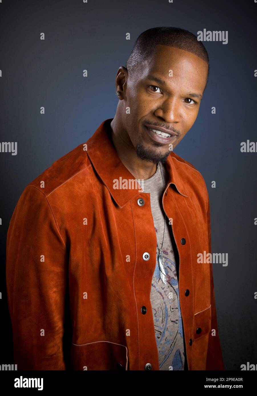 Actor Jamie Foxx poses for photographs after taping the Dave Thomas ...