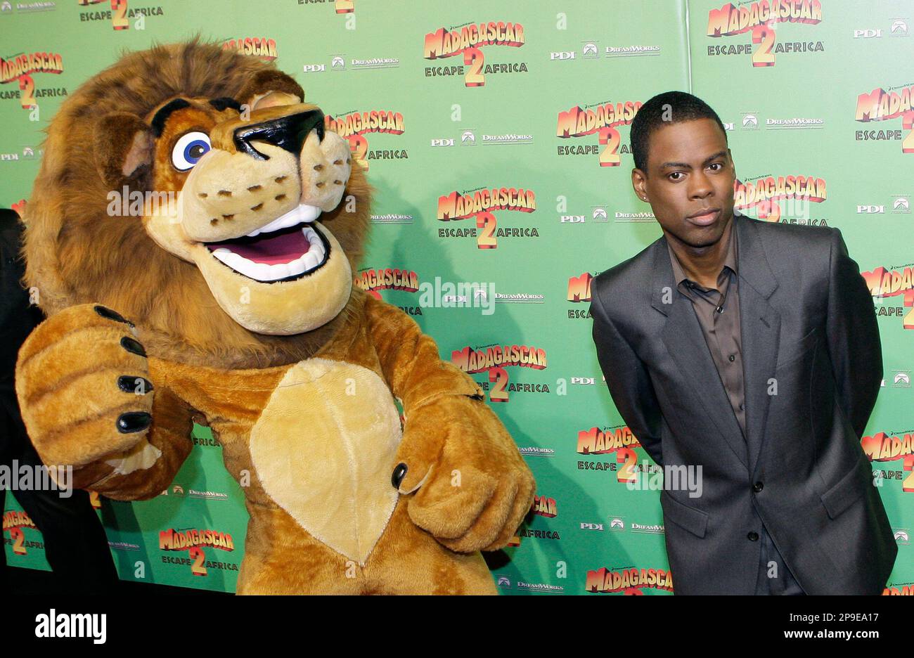 Chris Rock, the voice of Marty the zebra, poses for a photo with Alex ...