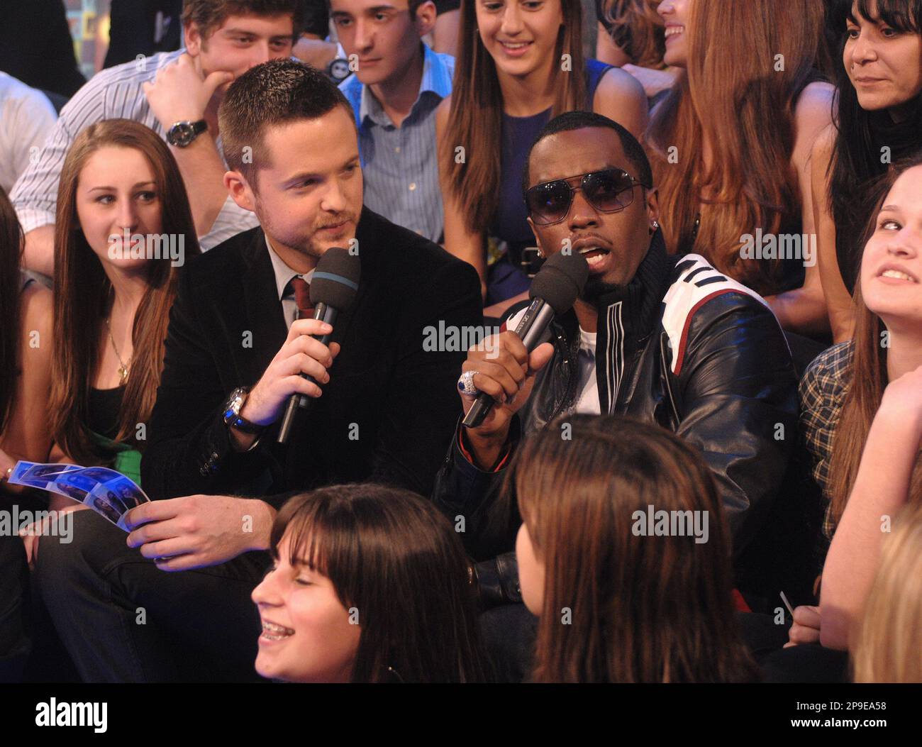 MTV VJ Damien Fahey,left, and Diddy make an appearance on MTV's TRL ...