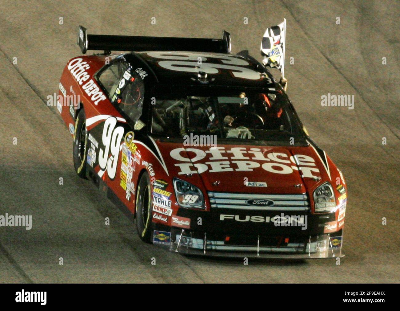 NASCAR driver Carl Edwards celebrates his win after the NASCAR Sprint ...
