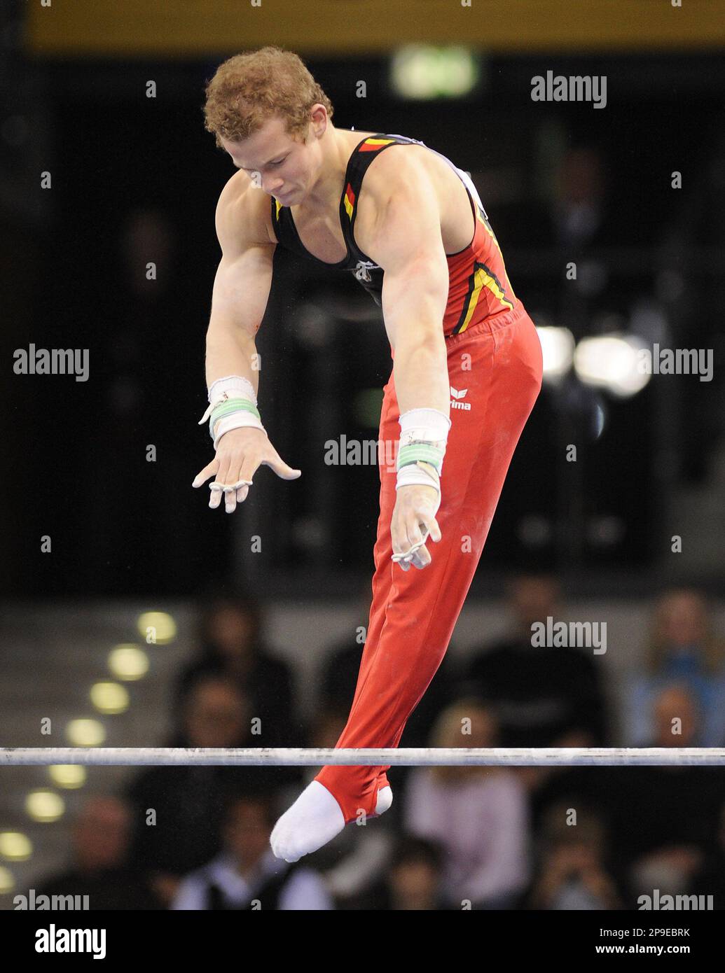 Germany's Fabian Hambuechen performs on the horizontal bar on his way ...