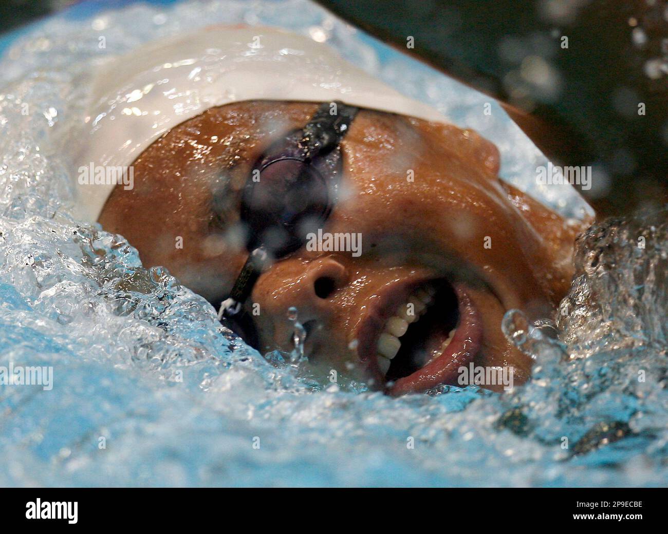 Coralie Balmy from France swims in a women's 100 meters freestyle heat ...