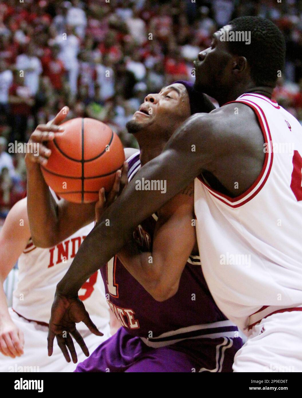 Northwestern State guard Dominic Knight, left, attempts to shoot ...