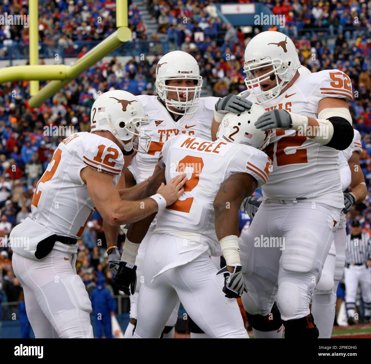 Texas running back Vondrell McGee (2) celebrates with quarterback Colt ...