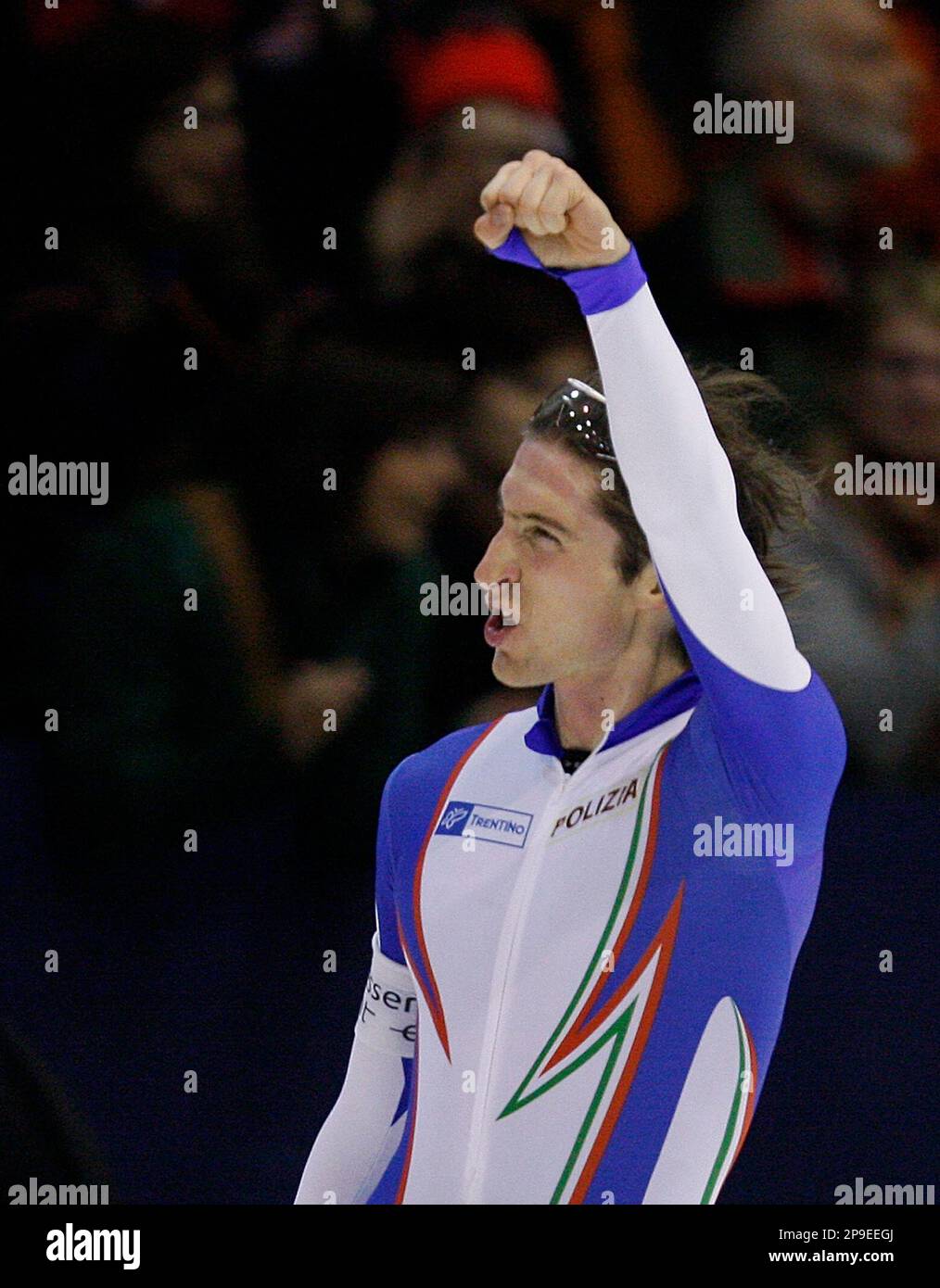 Italy's Enrico Fabris reacts after taking the third place in the men's ...
