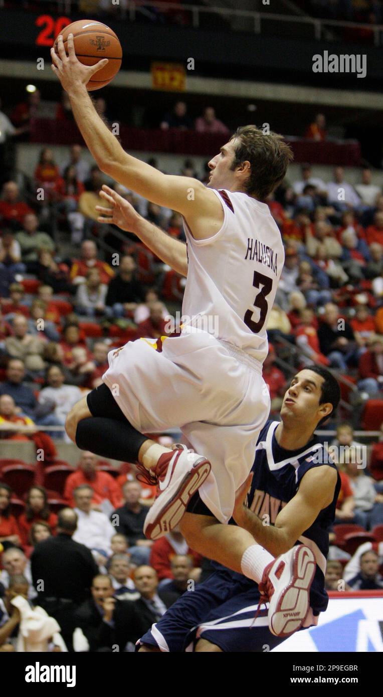 Iowa State's Sean Haluska drives to the basket over UC Davis' Adam ...