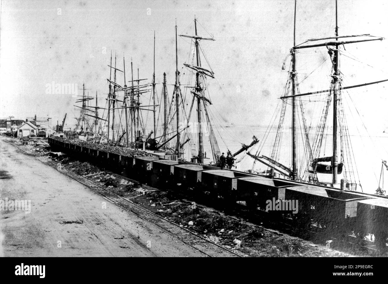 Loading coal onto ships at Greymouth, 1873, Westland, New Zealand Stock ...