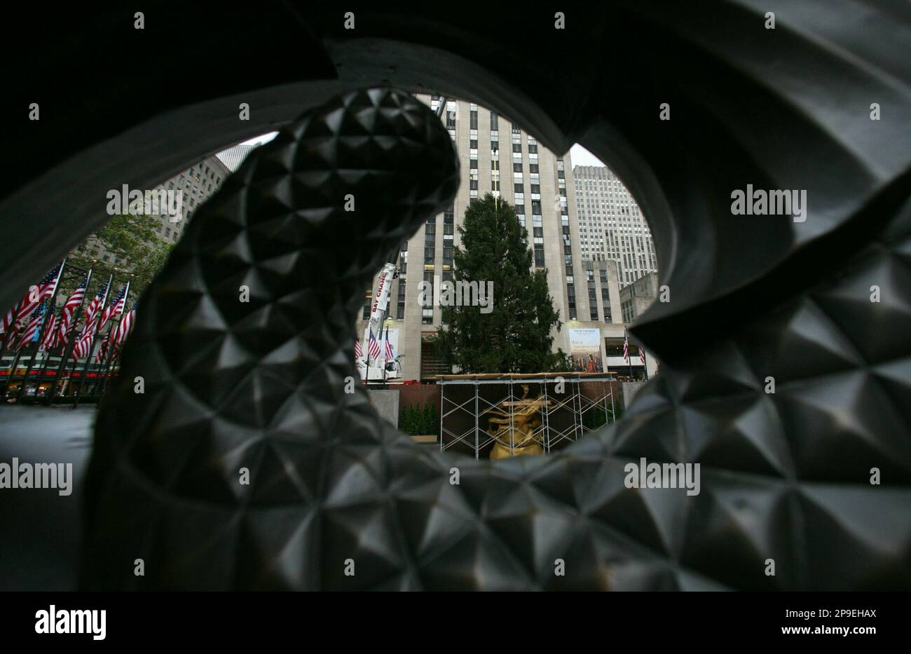 The 72-foot tall Rockefeller Center Christmas tree is viewed through a ...