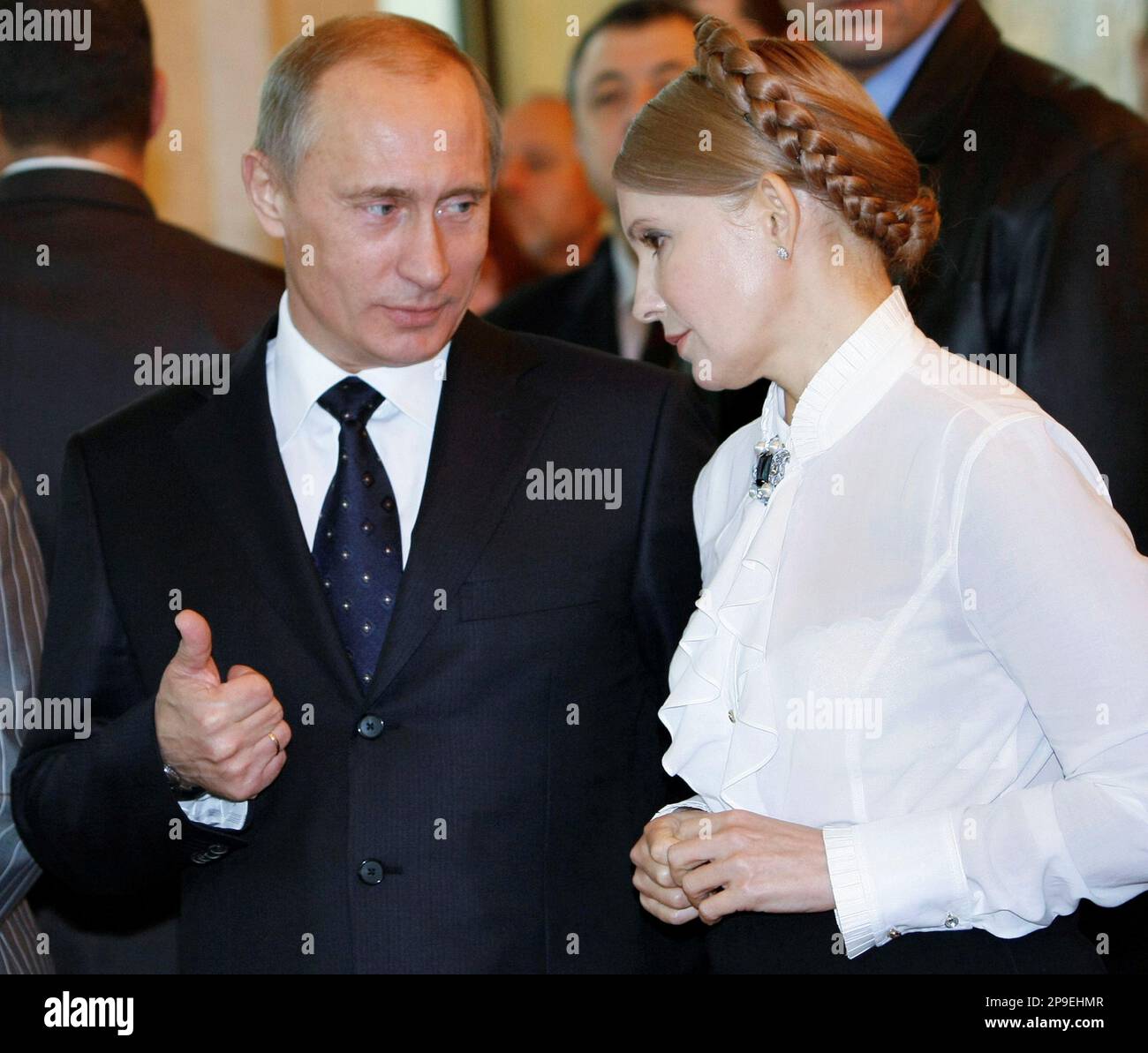 Ukrainian Prime Minister Yulia Tymoshenko, right, and Russian Prime Minister Vladimir Putin ...