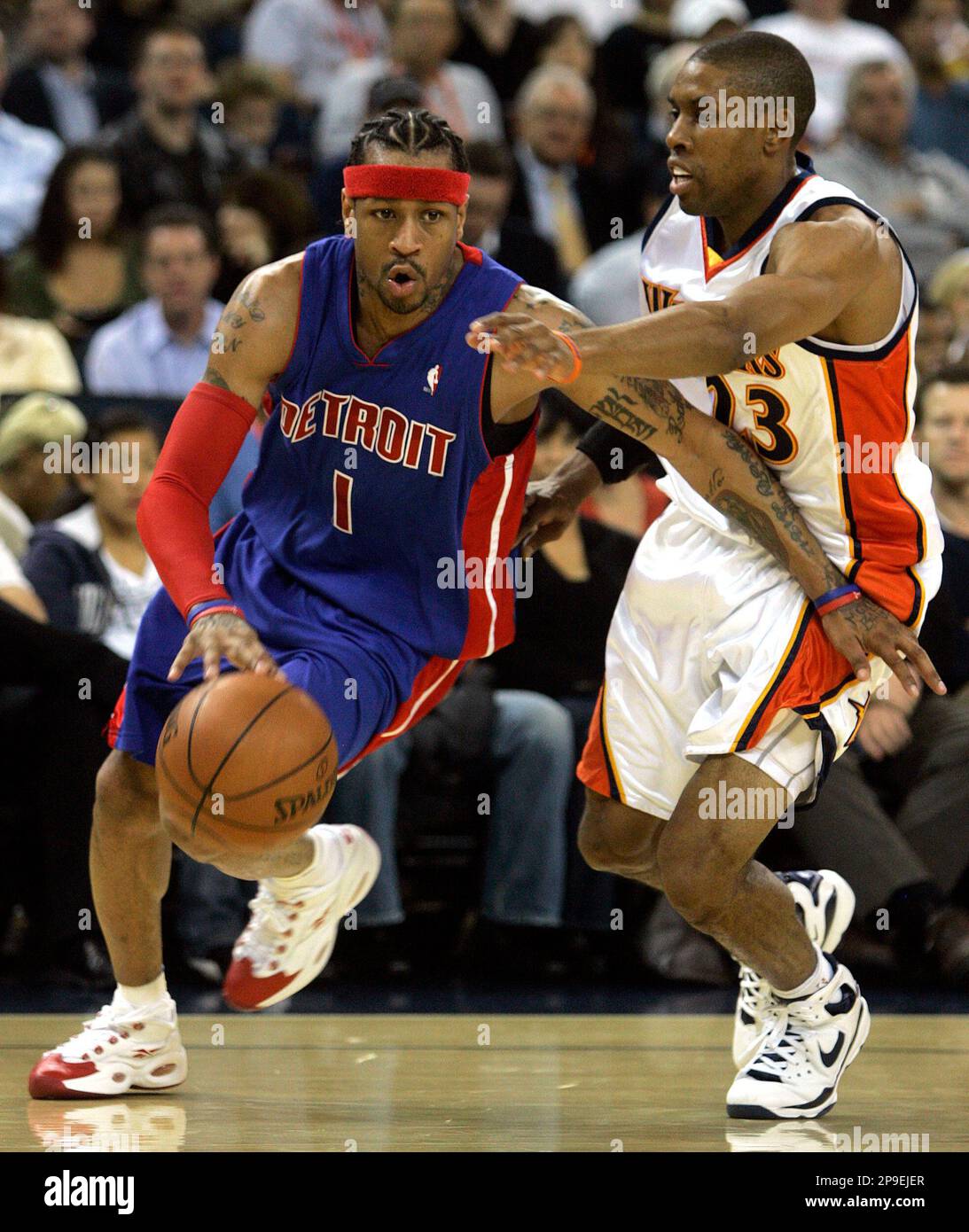 Detroit Pistons' Allen Iverson, left, drives past Golden State Warriors ...