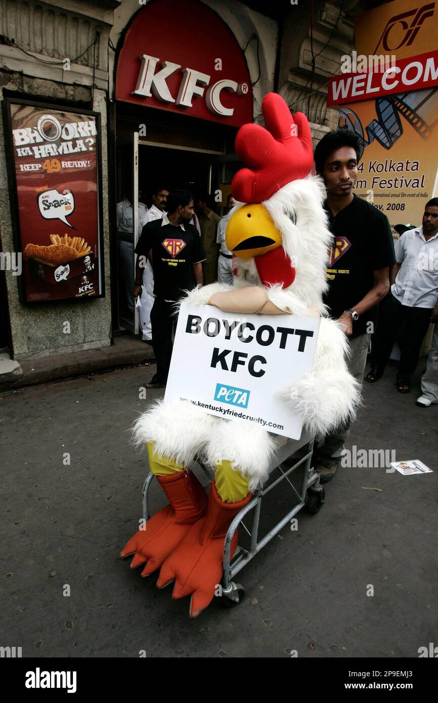 Activists of People for the Ethical Treatment of Animals, or PETA, walk ...