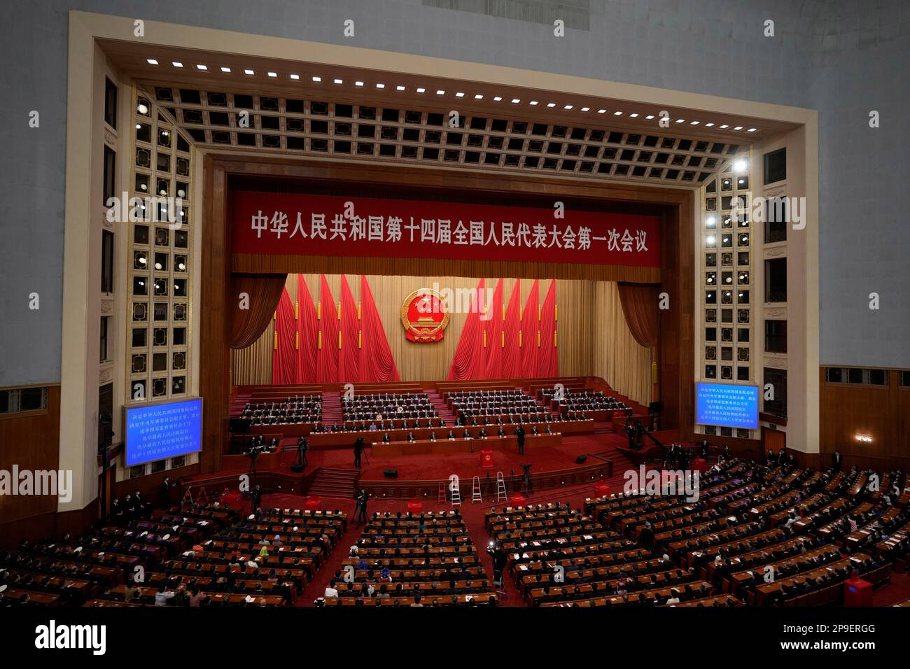 Delegates attend a session of China's National People's Congress (NPC ...
