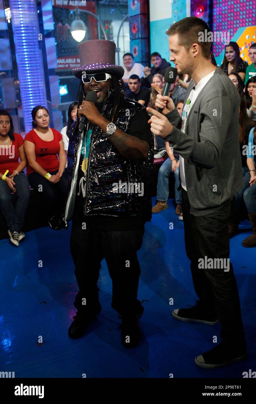 Rapper T-Pain appears onstage with VJ Damien Fahey during MTV's "Total ...