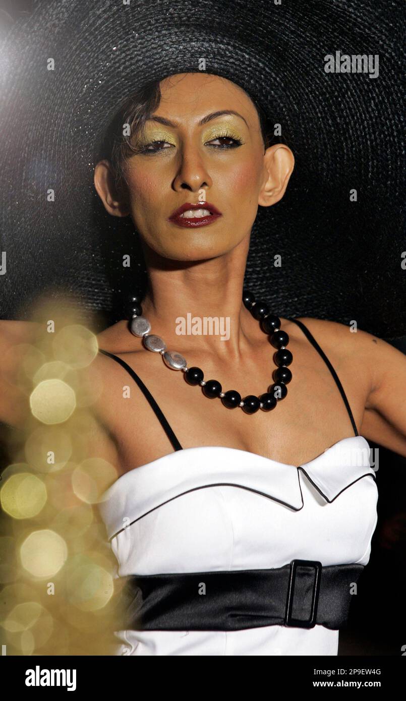 A Sri Lankan model displays clothes from the latest seasonal collection ...