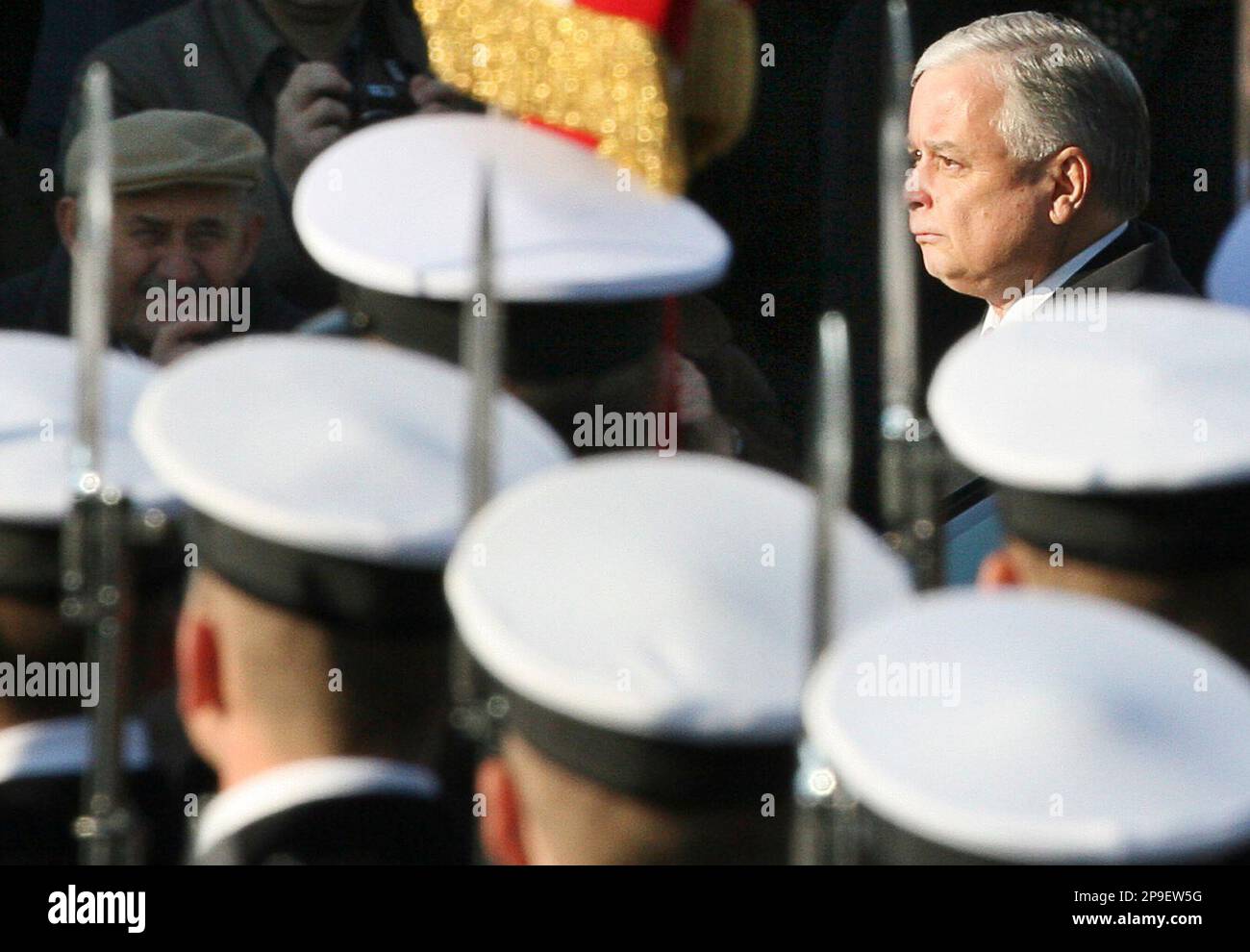 Poland's President Lech Kaczynski inspects troops during celebrations ...
