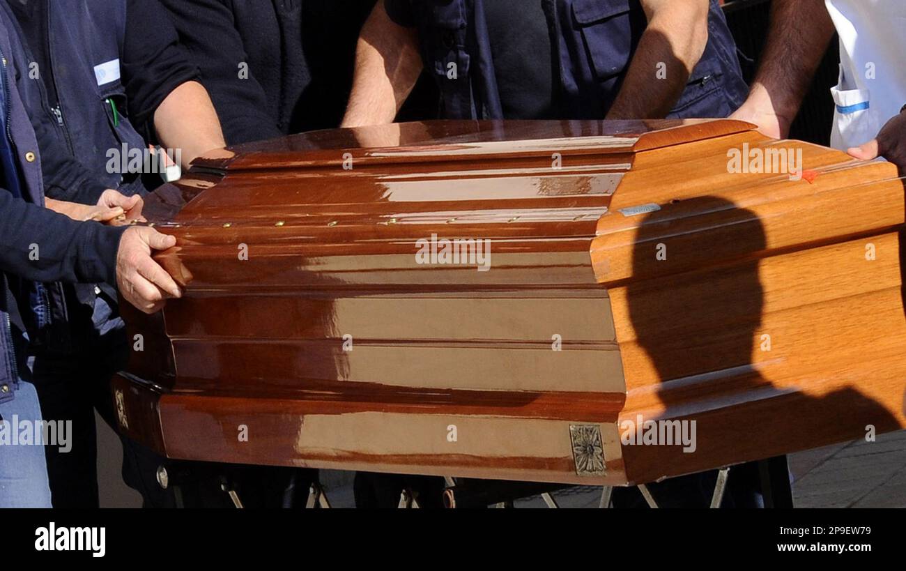 Workers transport the coffin of Miriam Makeba, the South African singer ...
