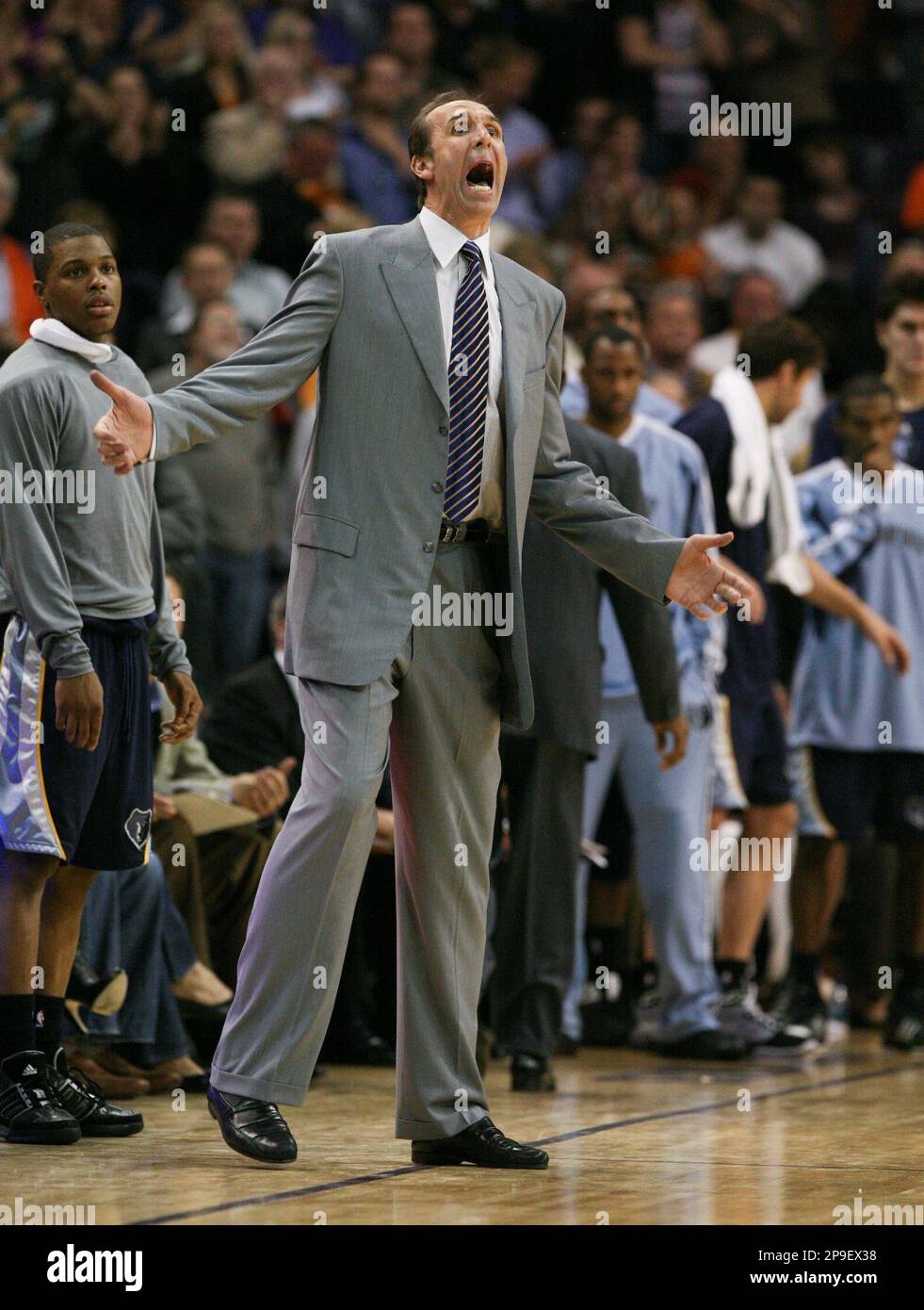 Memphis Grizzlies head coach Marc Iavaroni yells to his team as they ...