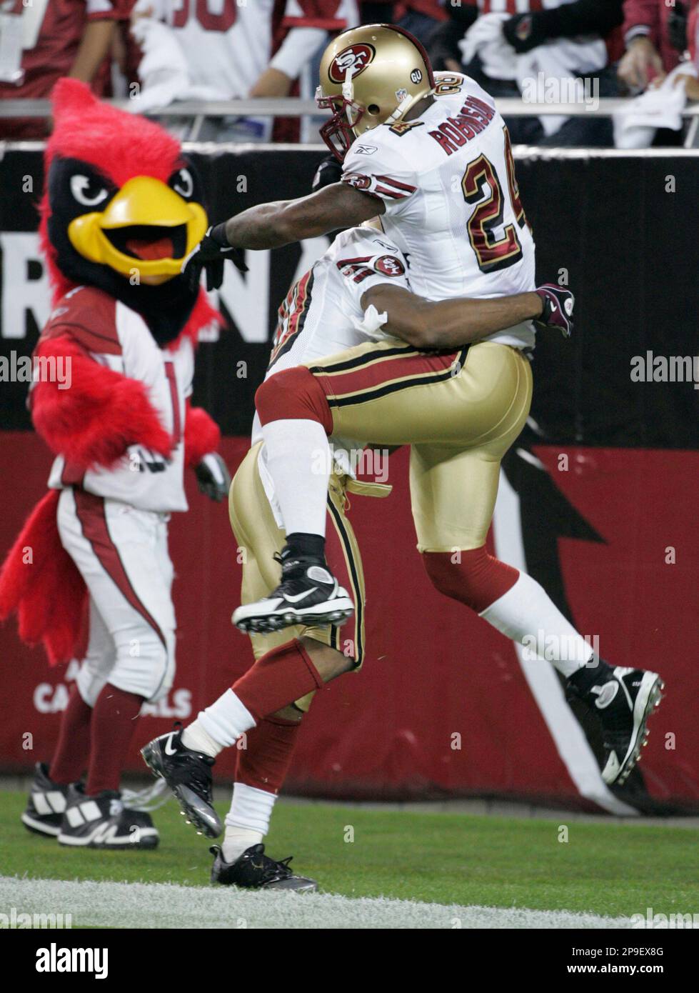 San Francisco 49ers' Allen Rossum, left, celebrates with Michael ...