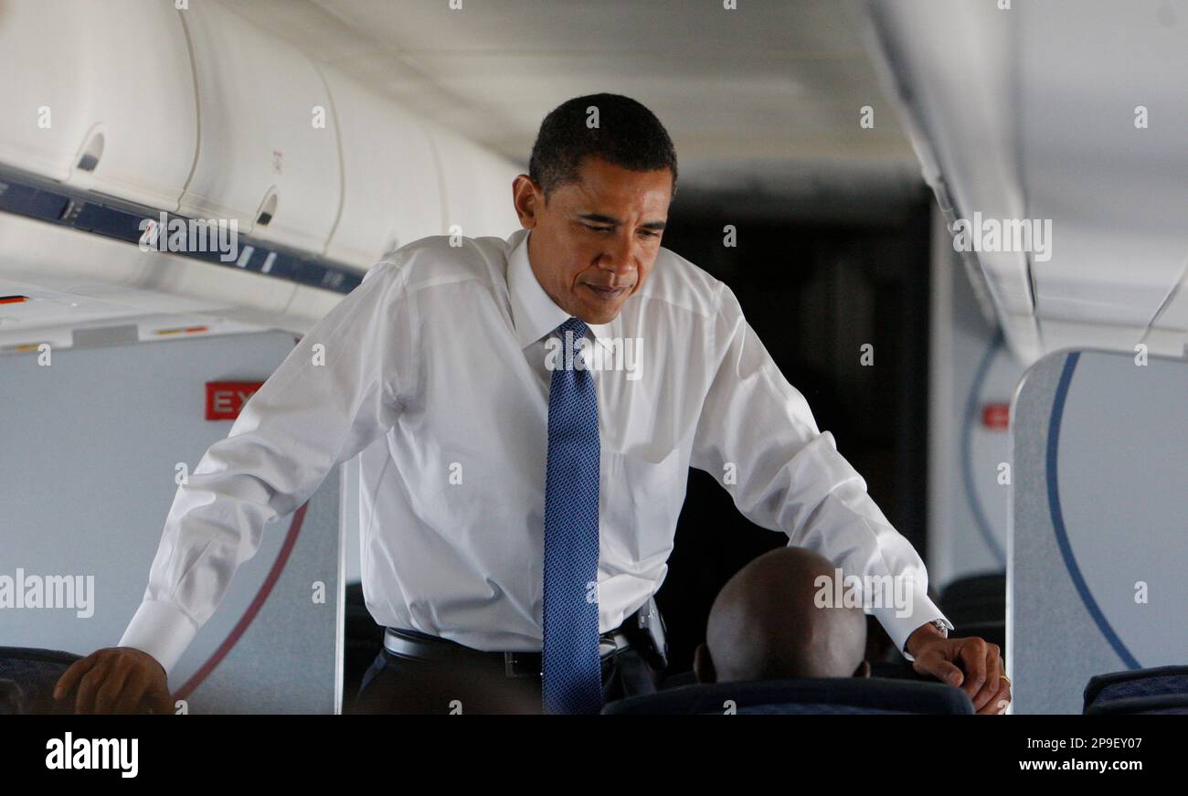 President-elect Obama is pictured on his plane flying from Chicago to ...