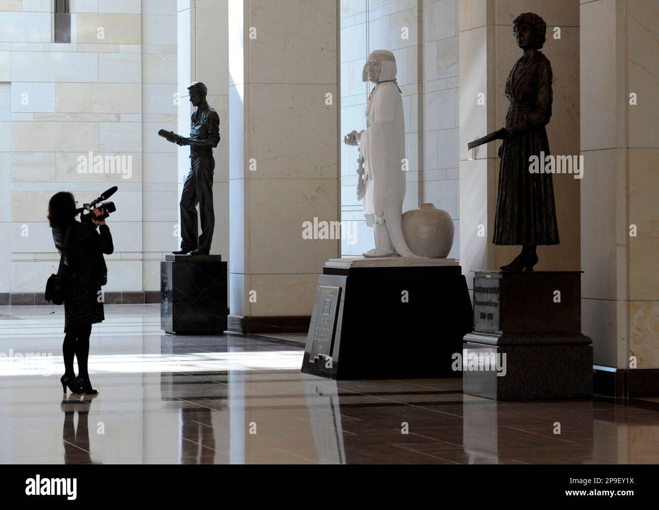 Statues in Emancipation Hall are photographed in the new Capitol ...