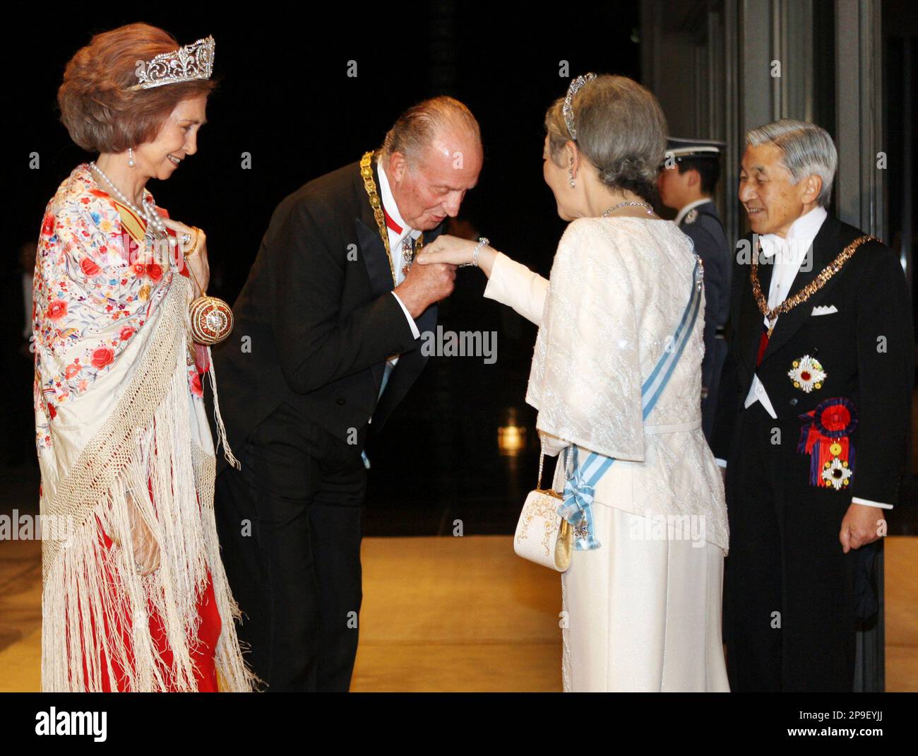Spain's King Juan Carlos, second from left and Queen Sofia, left, are ...