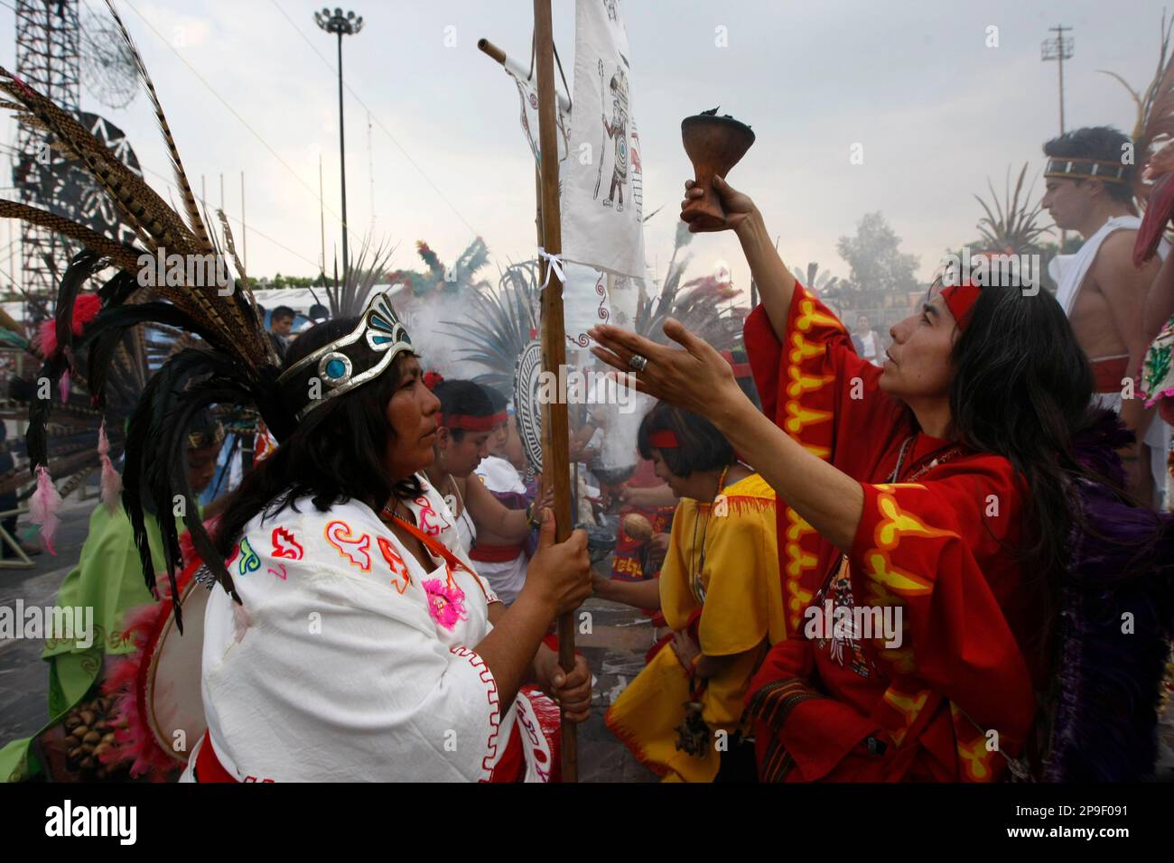 Aztec dancers perform a ritual at the Basilica of Guadalupe in Mexico ...