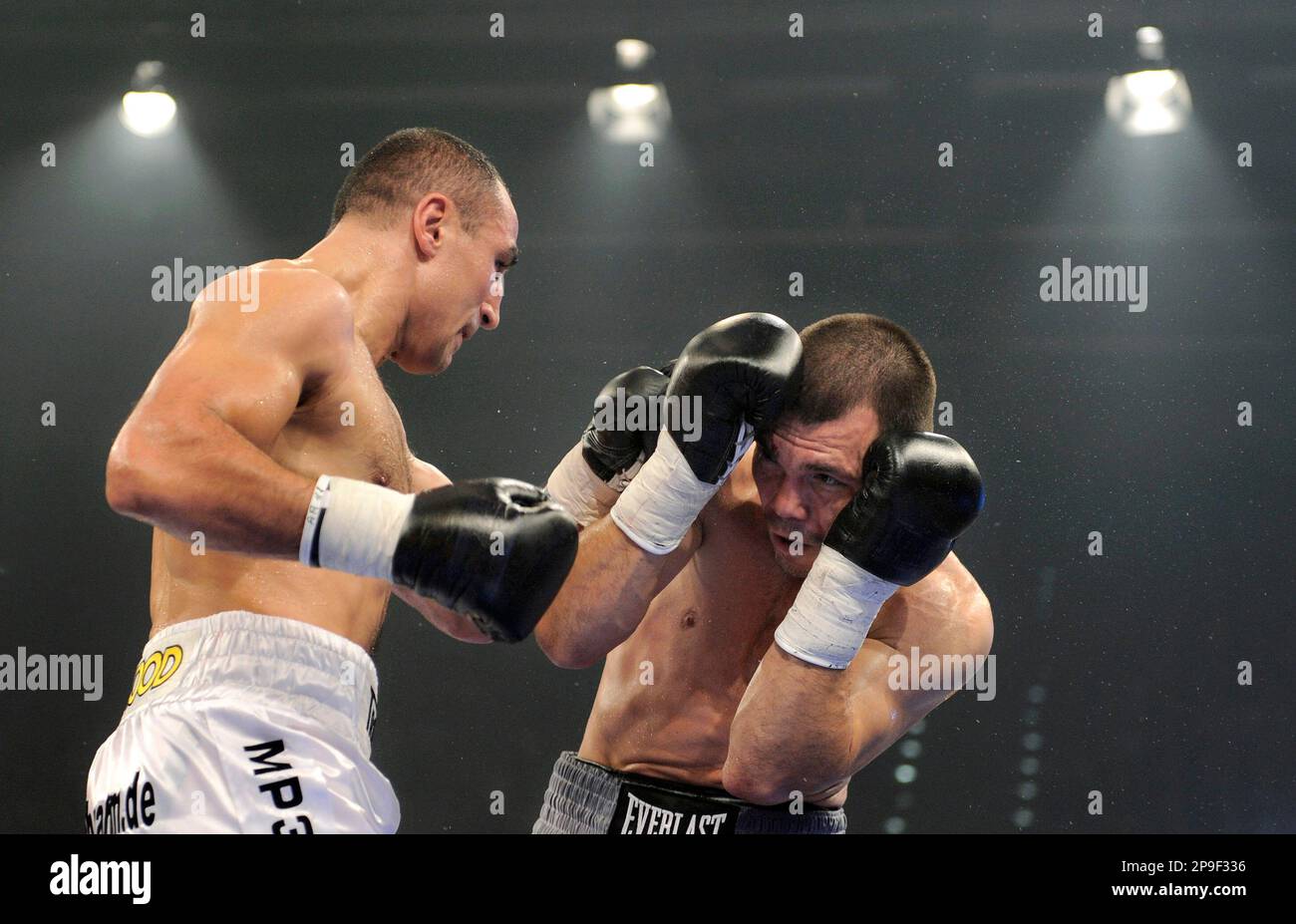 German boxer Arthur Abraham, left, punches American Raul Marquez during ...