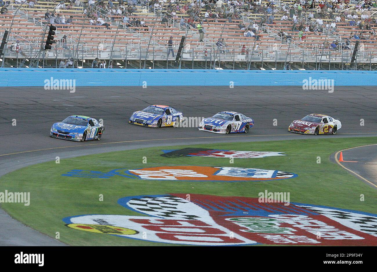 From left, Denny Hamlin, Carl Edwards, Jamie McMurray, and Clint Bowyer ...
