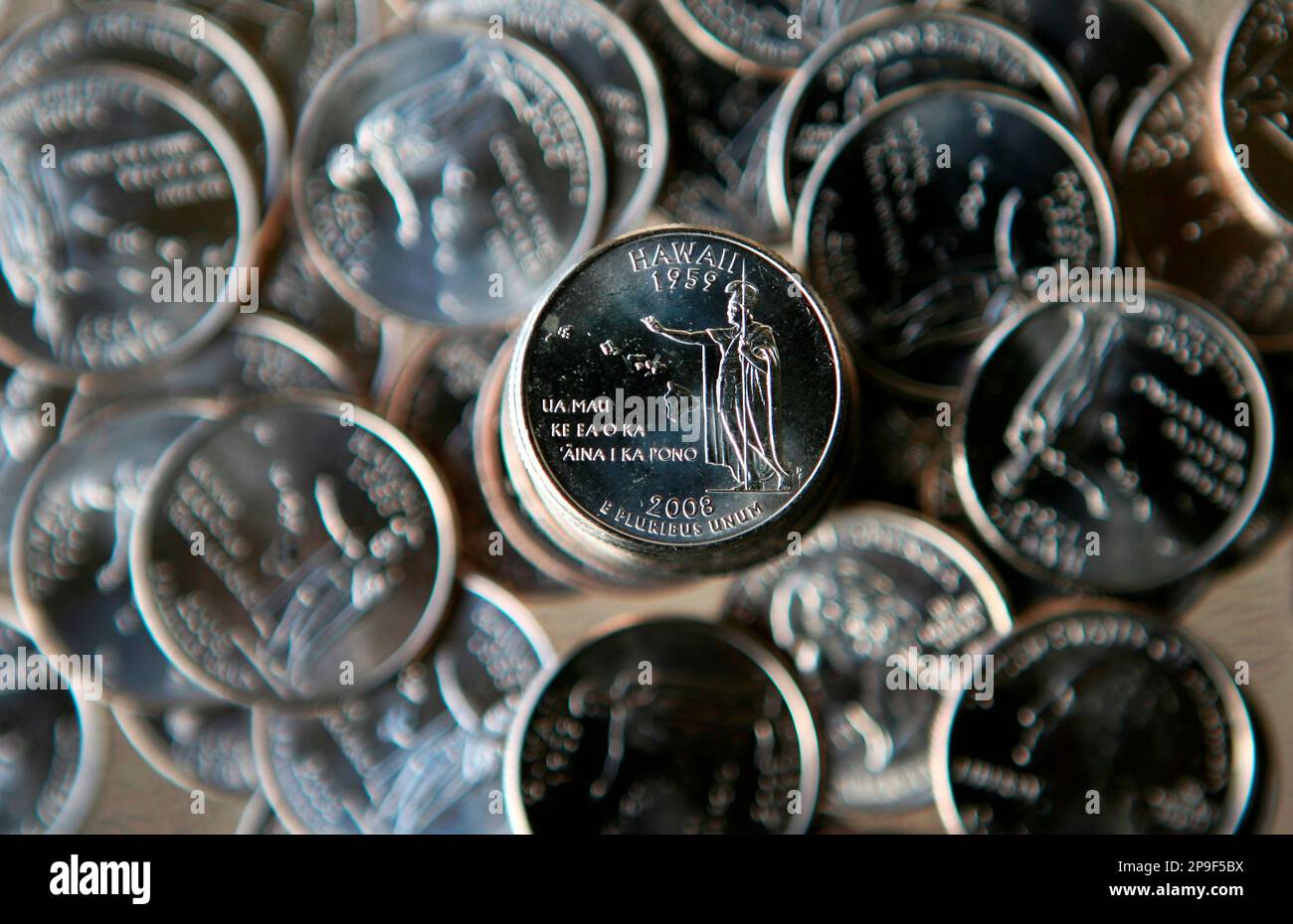 Quarters commemorating the state of Hawaii are shown on Friday, Nov. 7 ...